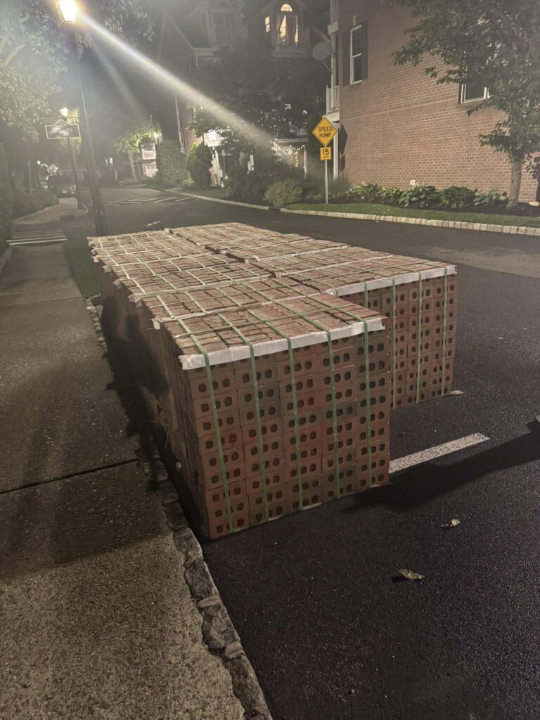 Who puts the random pallets of bricks on the streets - Peter Theil